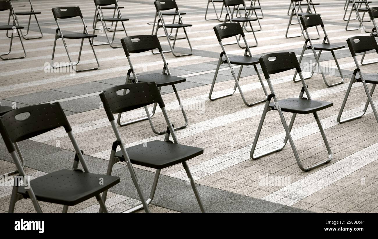 Folding chairs lined up at the event venue in the square Stock Photo ...
