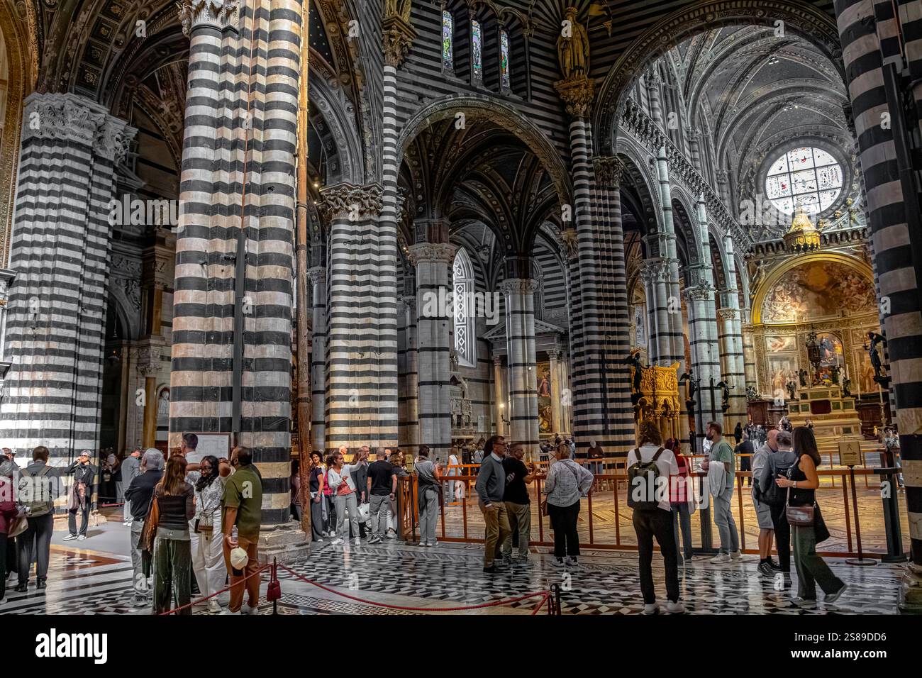 People admiring the stunning interior of Siena Cathedral a 13th-century ...
