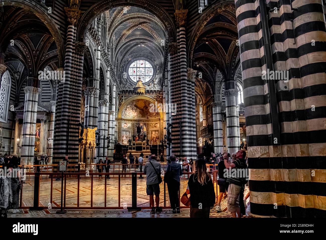 People admiring the stunning interior of Siena Cathedral a 13th-century ...