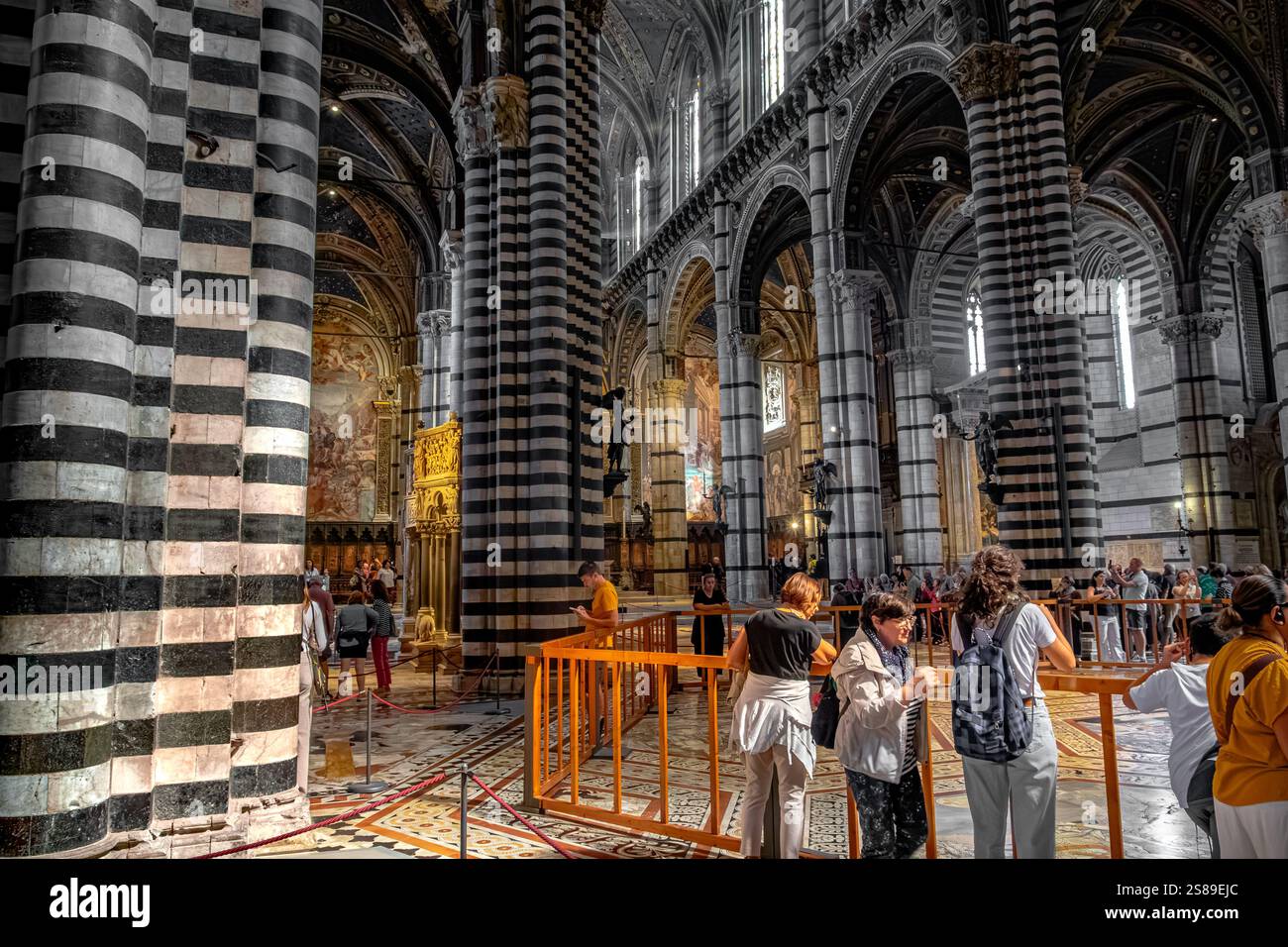 People admiring the stunning interior of Siena Cathedral a 13th-century ...