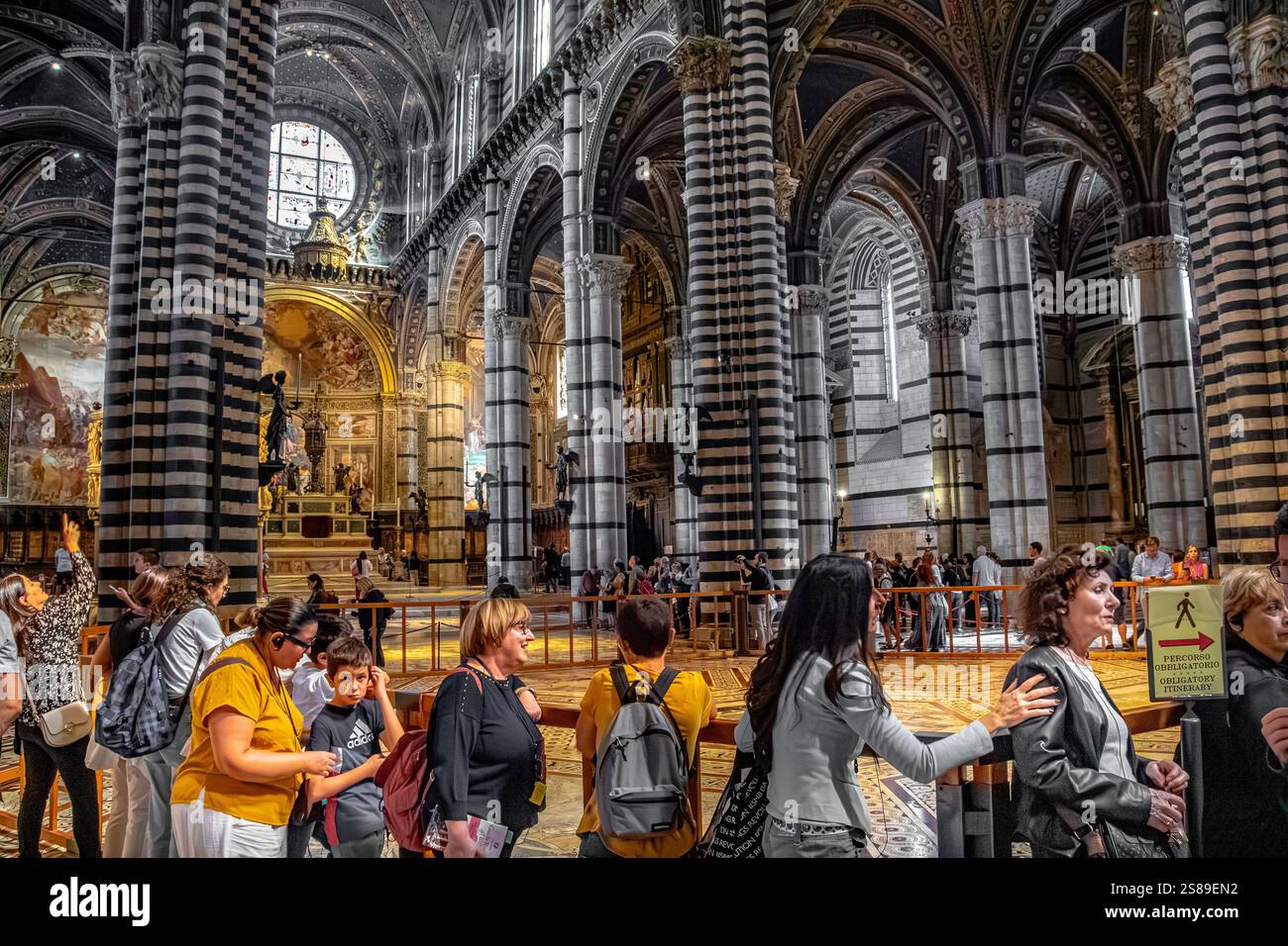 People admiring the stunning interior of Siena Cathedral a 13th-century ...