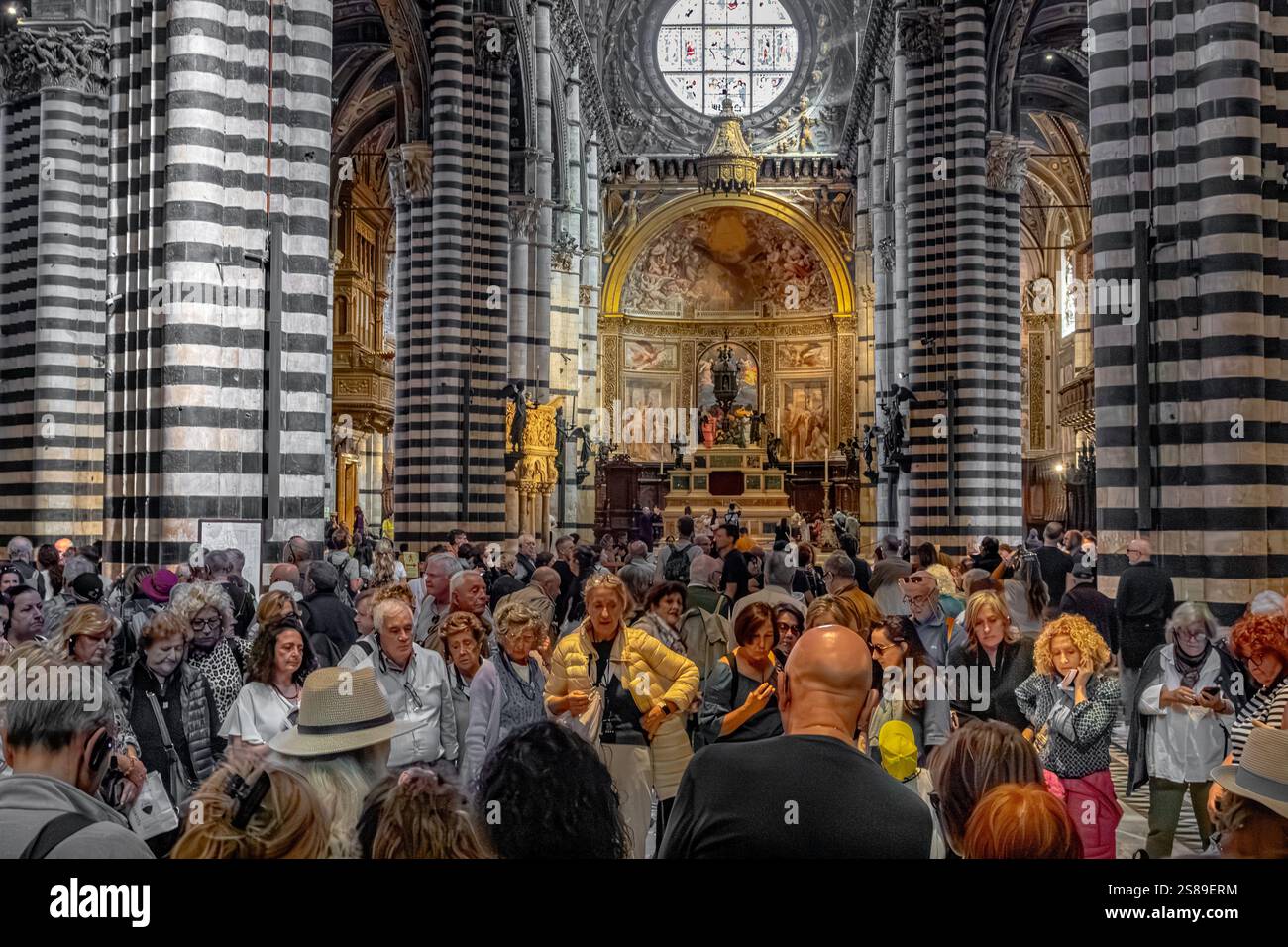People admiring the stunning interior of Siena Cathedral a 13th-century ...
