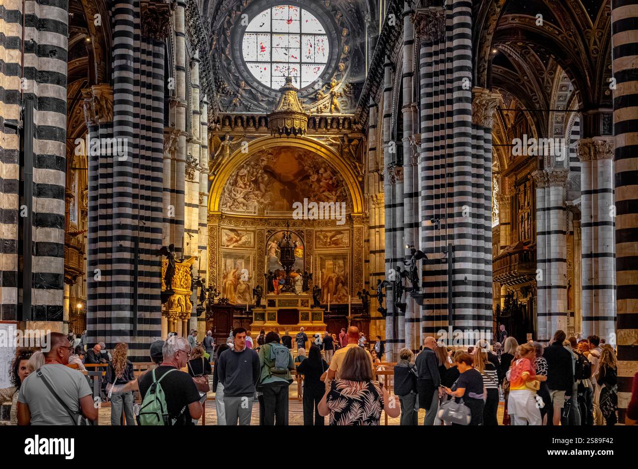 People admiring the stunning interior of Siena Cathedral a 13th-century ...