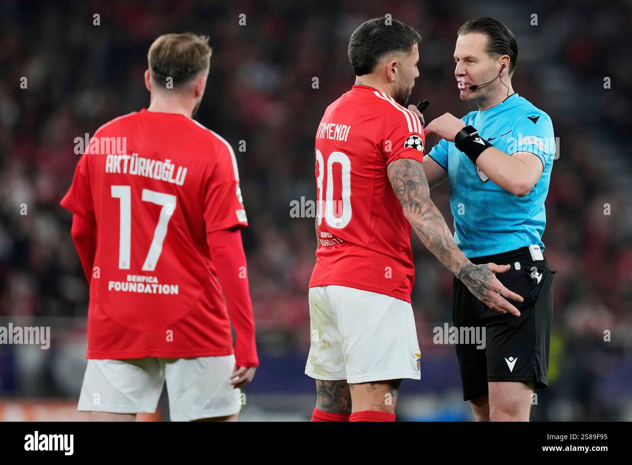 Referee Danny Makkelie speaks with Benfica's Nicolas Otamendi during a ...
