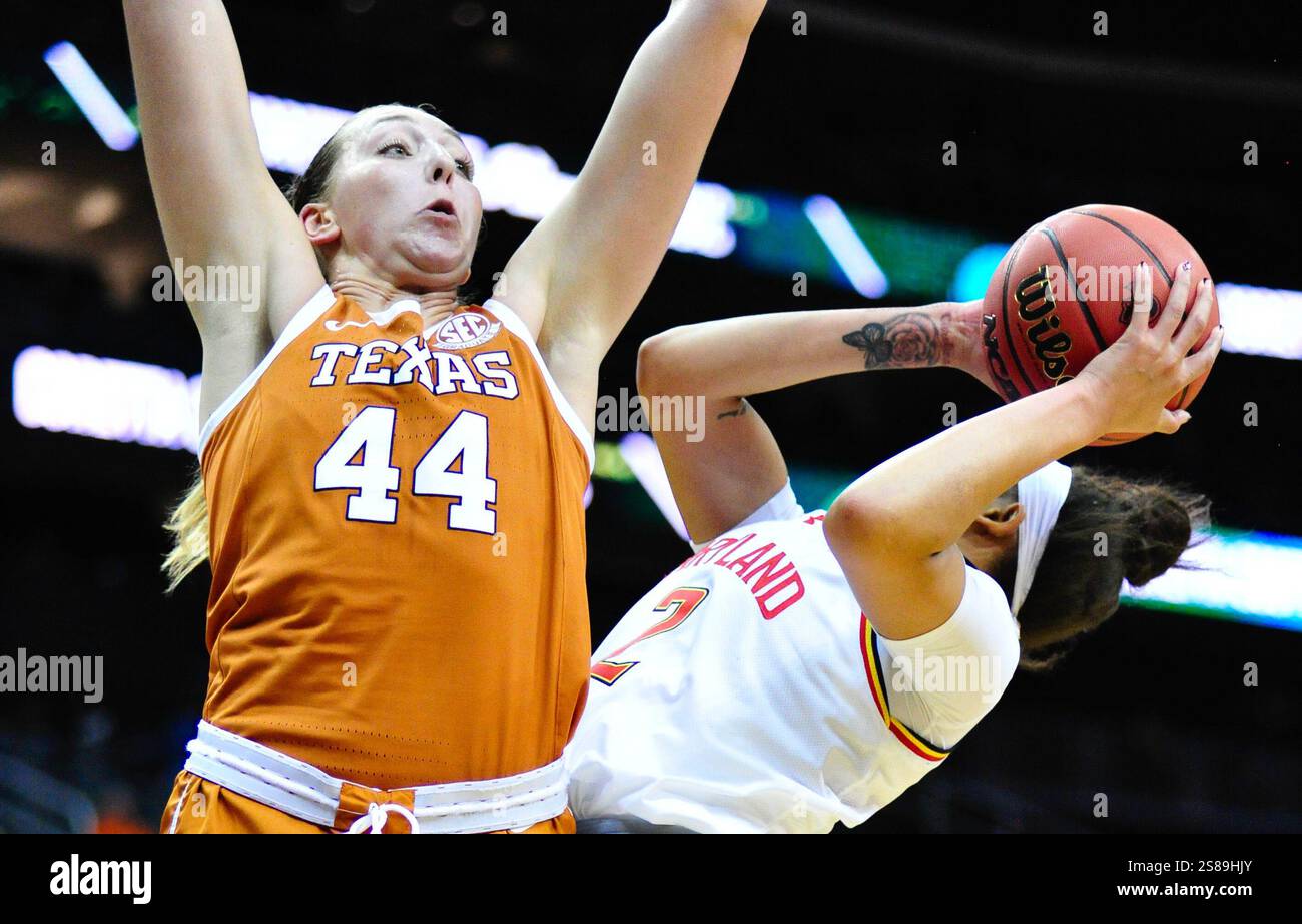 Newark, USA. 20th Jan, 2025. Taylor Jones (44) of Texas blocks a shot ...