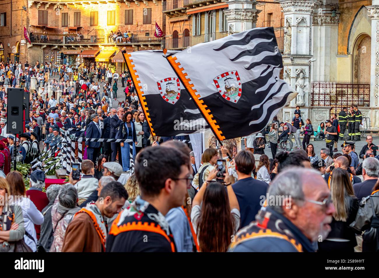 Flags of the Lupa (She-Wolf) Contrada in Siena at a Contrada parade in ...
