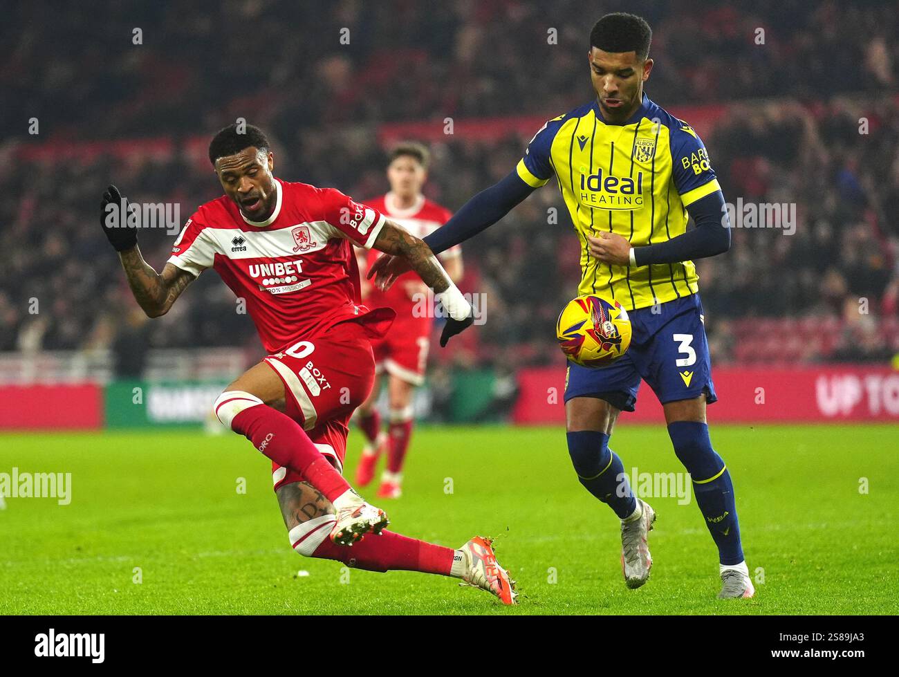 Middlesbrough's Delano Burgzorg (left) and West Bromwich Albion's Mason ...