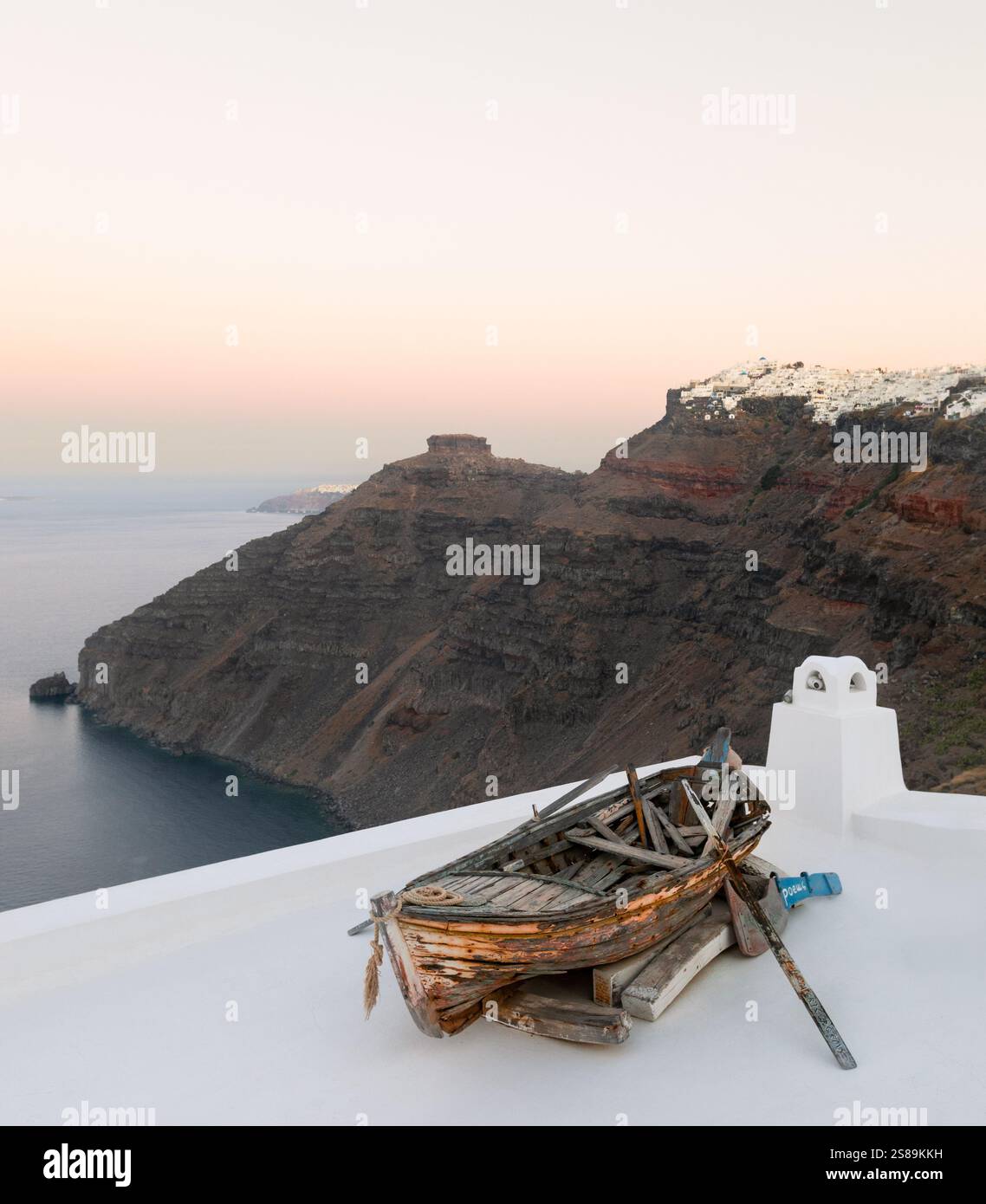 Old boat, Santorini, sunset view Stock Photo - Alamy