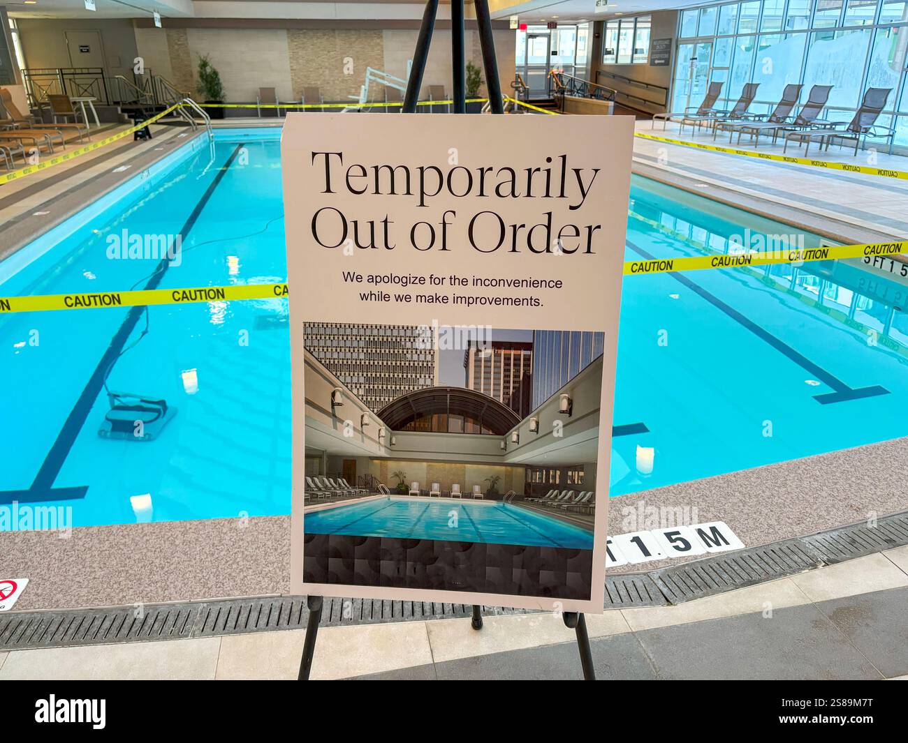 Sign indicating swimming pool closure for improvements at a city center ...