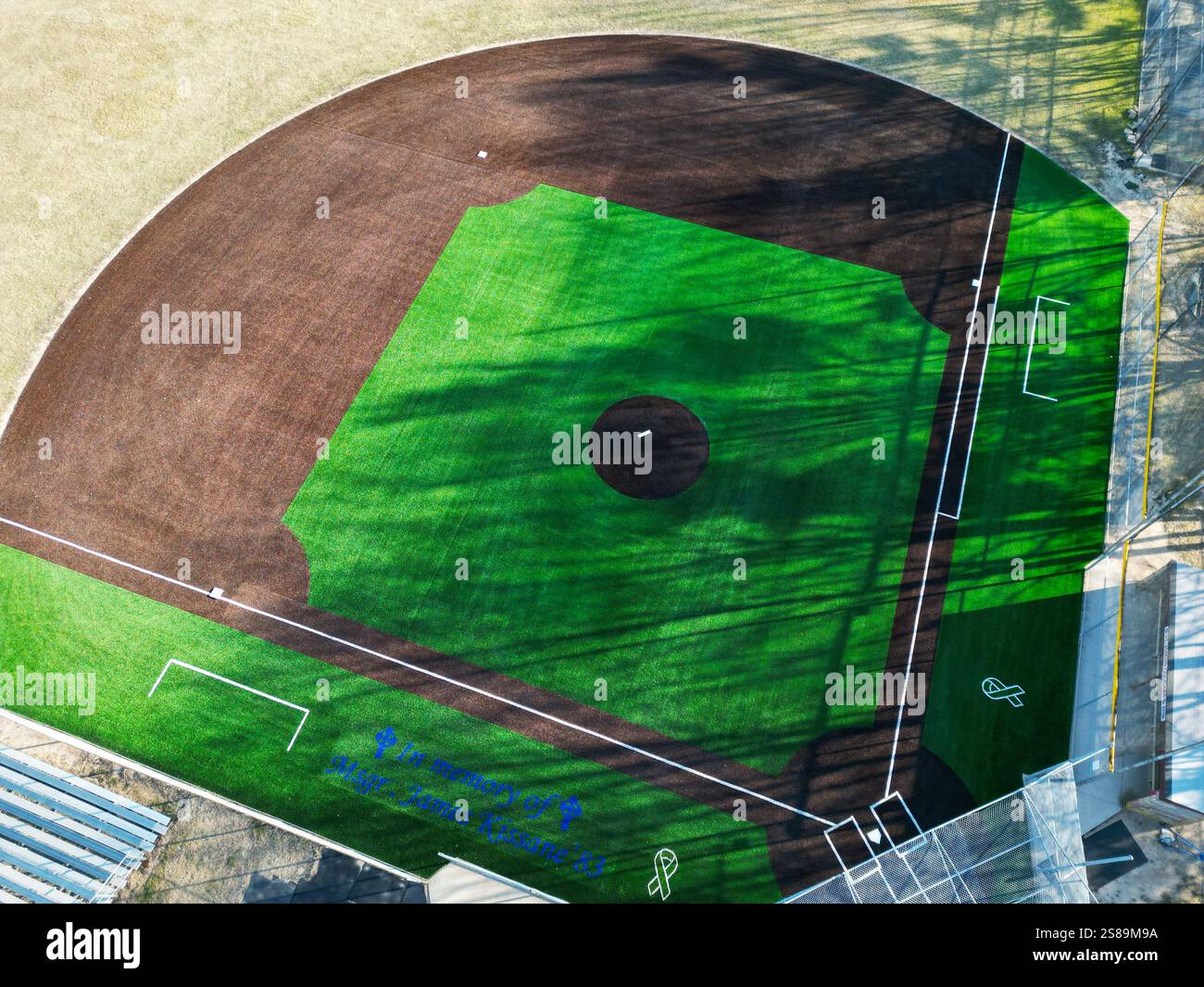 Aerial perspective reveals a newly installed artificial turf baseball ...