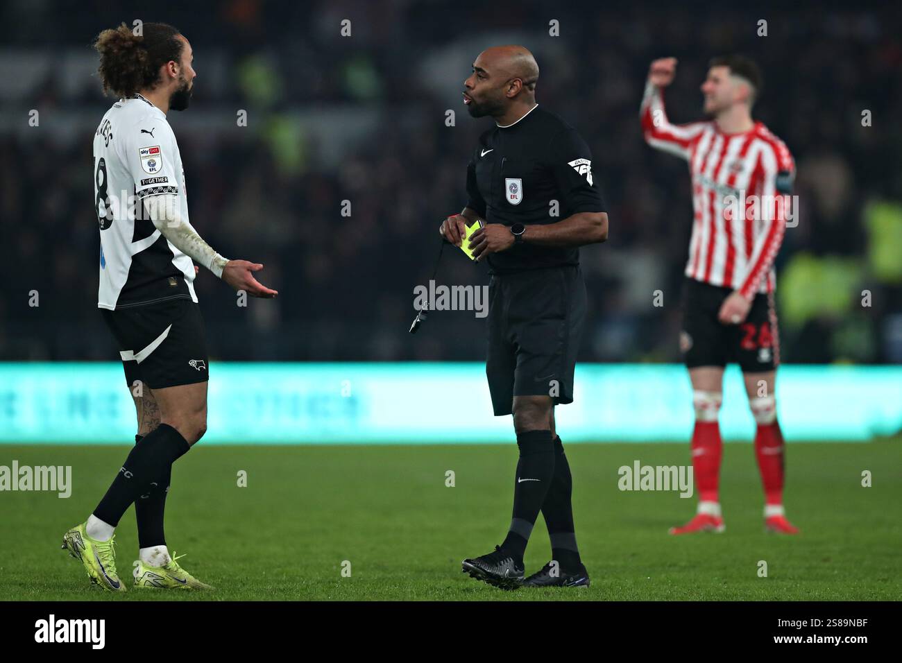 Derby, UK. 21st Jan, 2025. Marcus Harness of Derby County is shown a ...