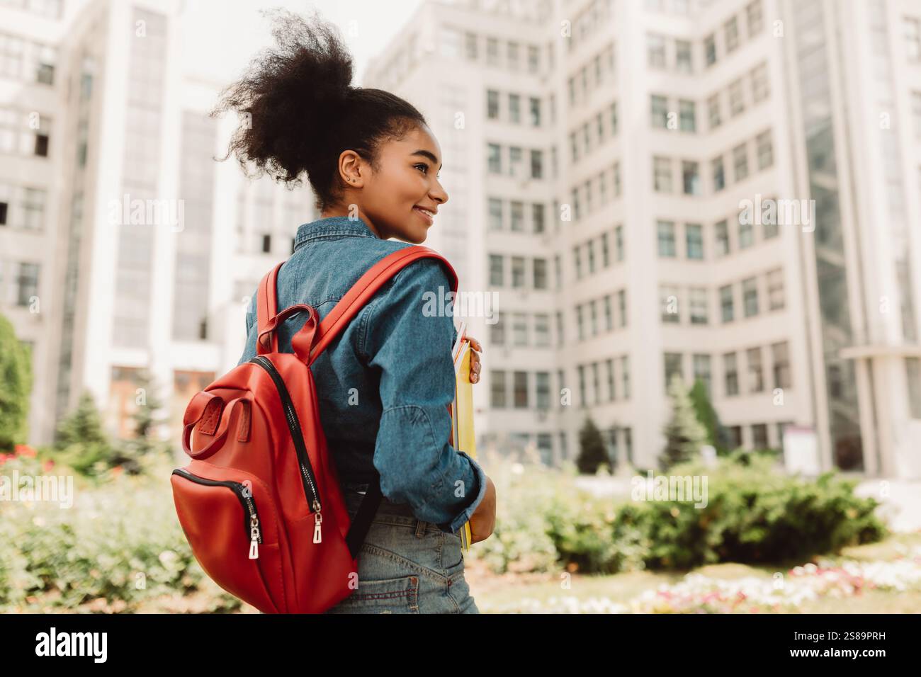 Student Girl Posing With Backpack Standing Back To Camera Outside Stock ...