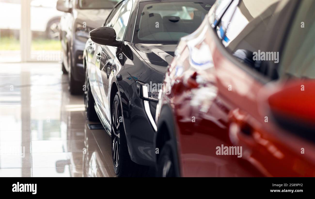 Closeup of brand new luxury automobiles in vip showroom Stock Photo - Alamy