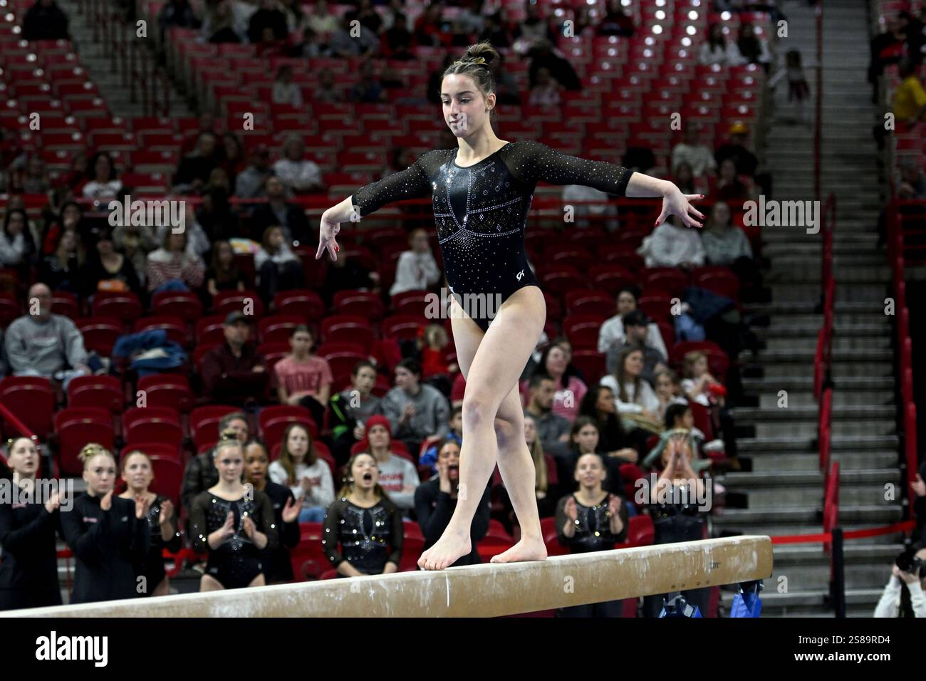 Denver gymnast Madison Ulrich competes on the balance beam during an ...