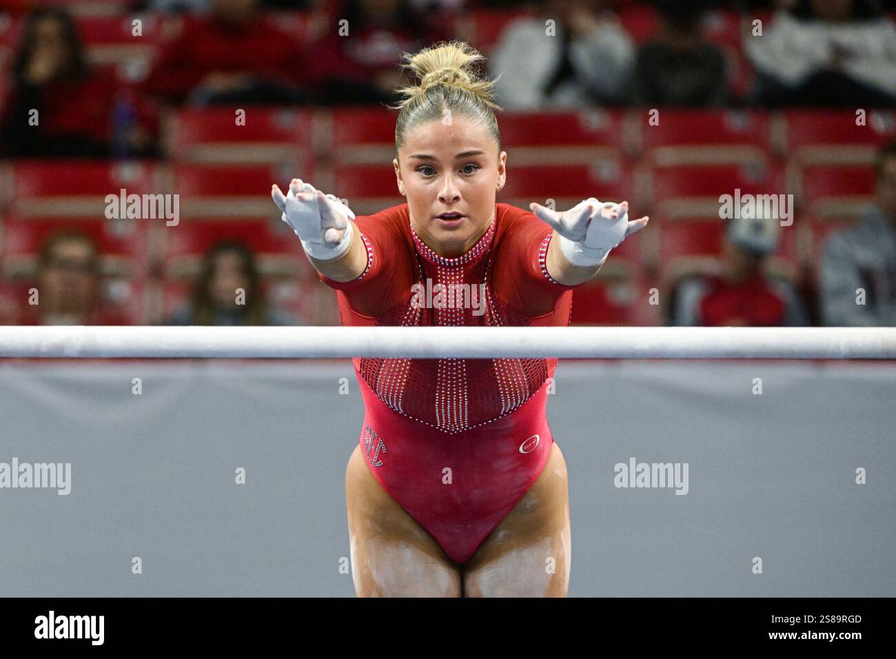 Arkansas gymnast Cally Swaney on the uneven bars during an NCAA ...