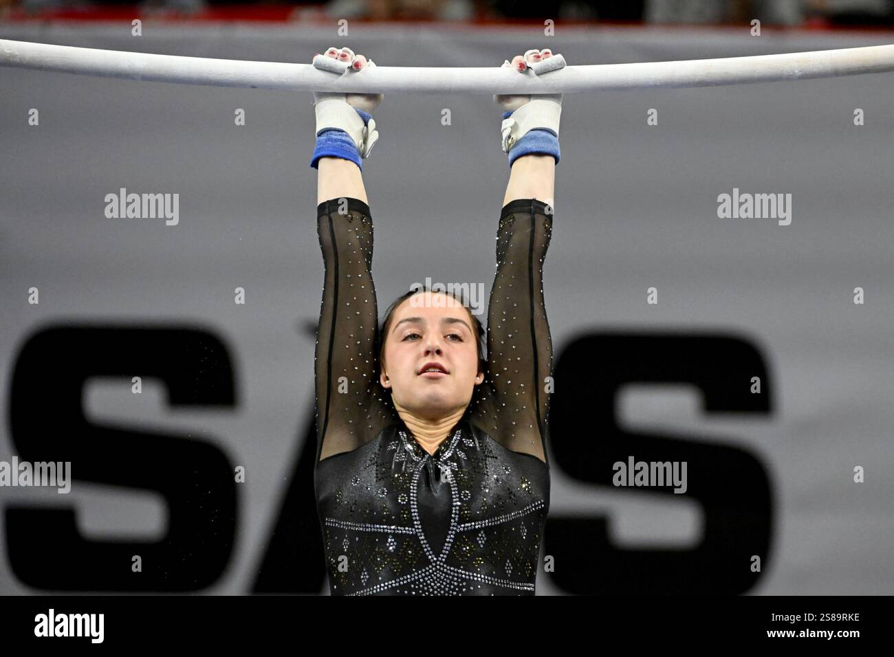 Denver gymnast Madison Ulrich competes on the uneven bars during an ...