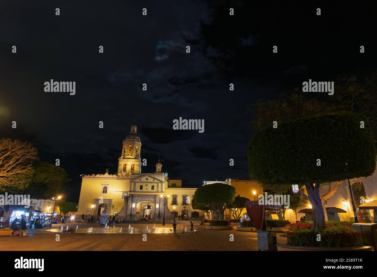 The striking Santuario y Exconvento de la Santa Cruz is illuminated ...
