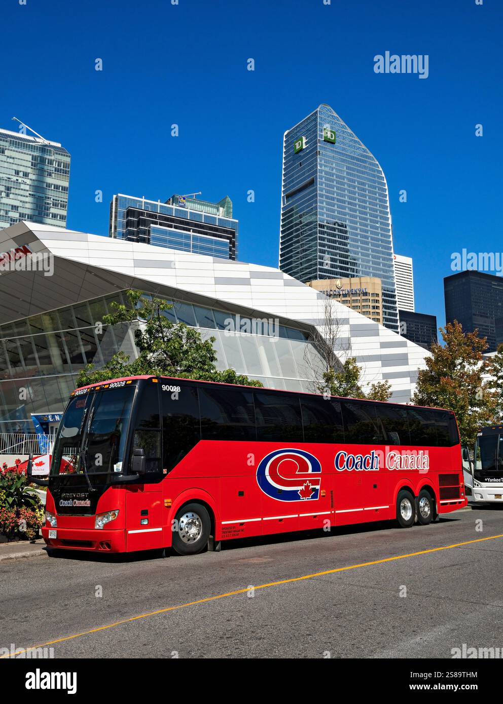 Toronto Canada / A Coach Canada Bus transports tourists to the CN Tower ...