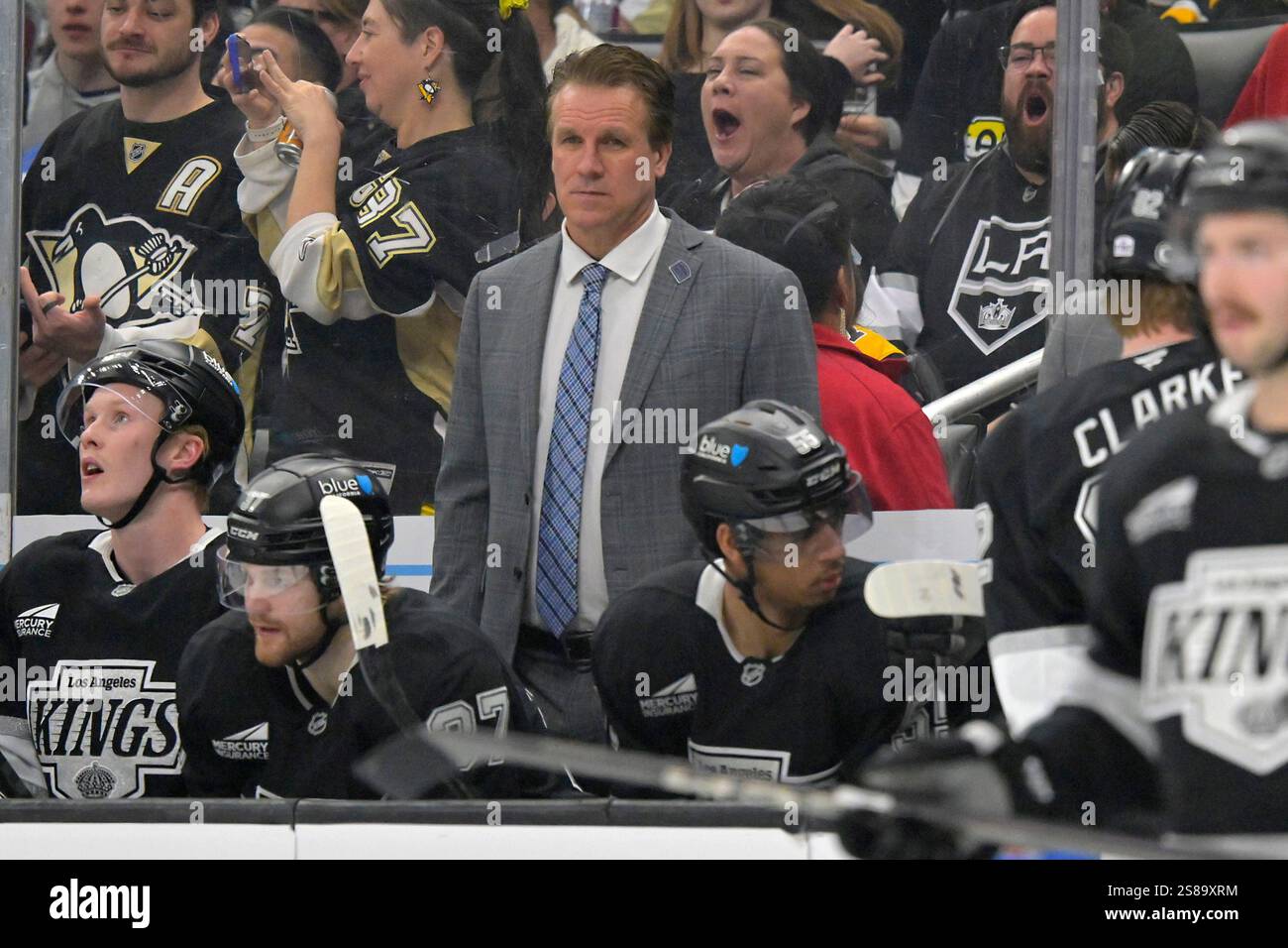 Los Angeles Kings head coach Jim Hiller look on from the bench during ...