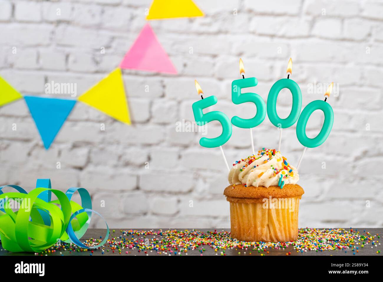 Candle number 5500 - Number of followers or likes Stock Photo - Alamy