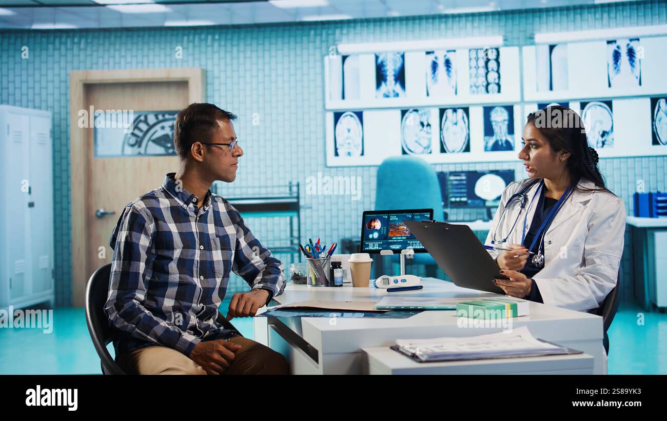 Indian healthcare professional sharing medical expertise with a patient ...