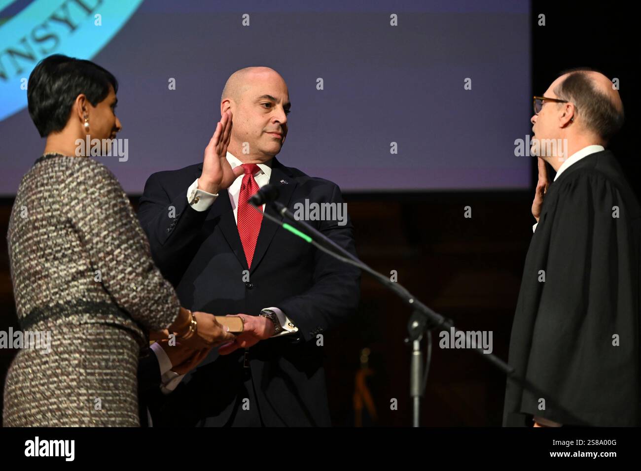 Dave Sunday, with his wife Lishani, takes the oath of office from York ...