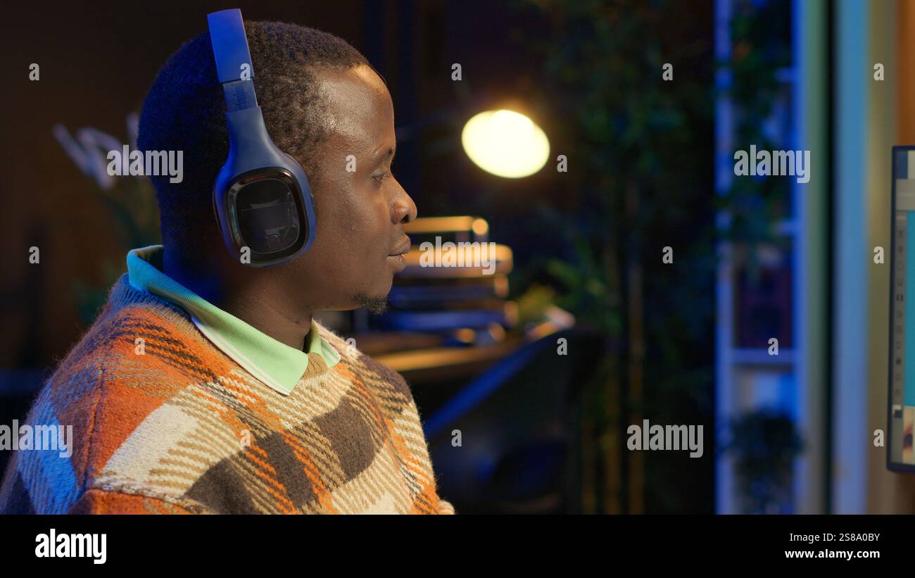 African american graphic editor working on image retouching project on ...