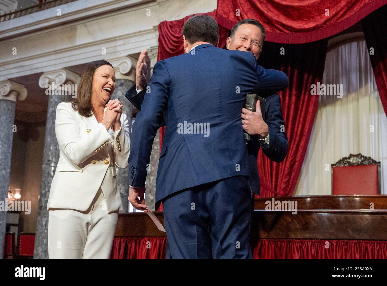 Washington, United States. 21st Jan, 2025. Vice President JD Vance hugs ...