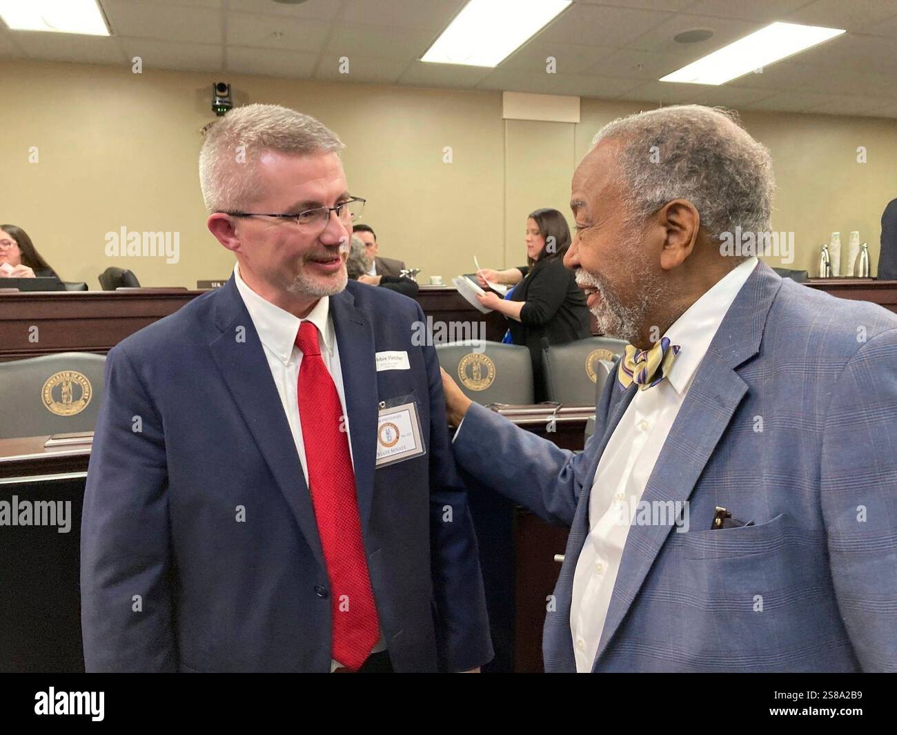 FILE - Robbie Fletcher, left, chats with Kentucky state Sen. Gerald ...