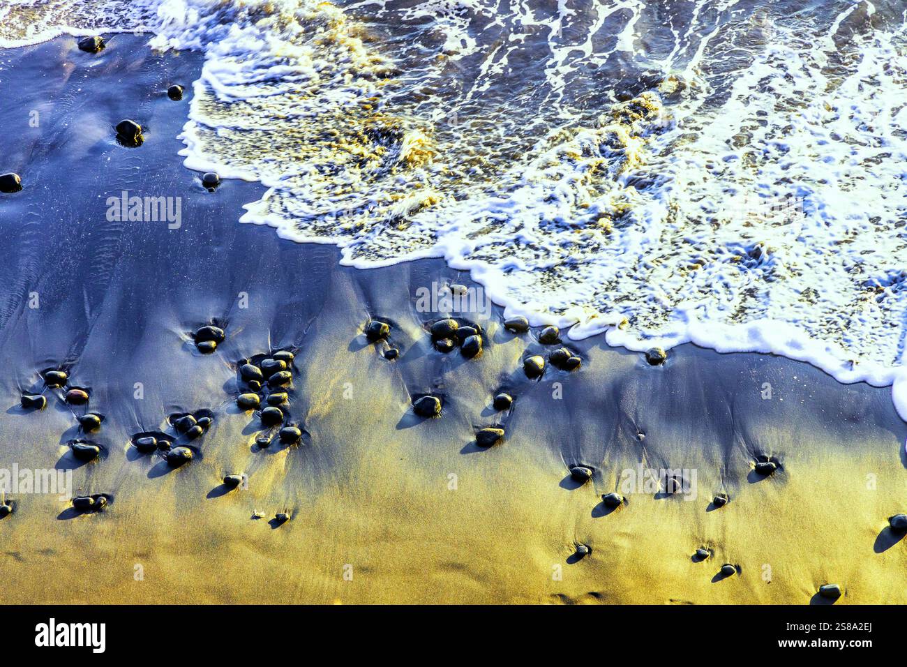 Rocky shoreline at Cemagi Beach, Bali, Indonesia Stock Photo - Alamy