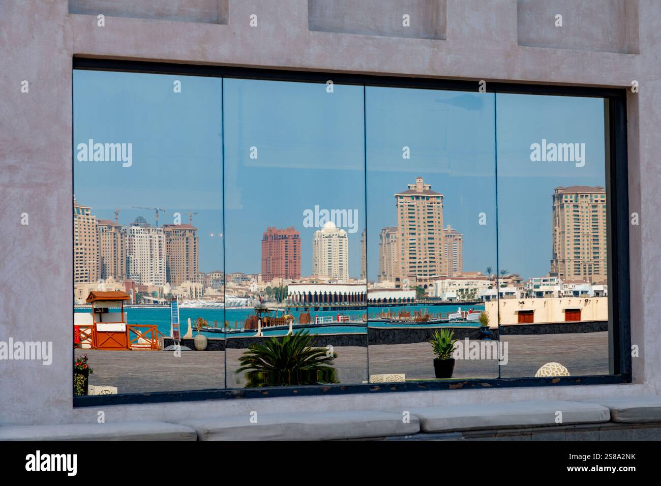 Qatar, Doha. Skyline as seen in reflection Stock Photo - Alamy