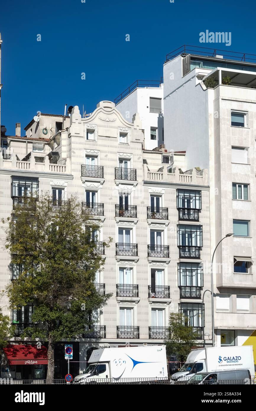 Traditional Spanish buildings with classic architecture along Calle de ...