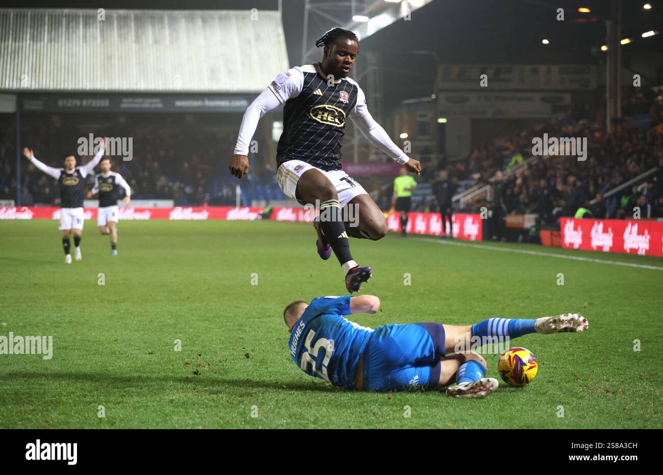 Peterborough, UK. 21st Jan, 2025. Millenic Alli (EC) Sam Hughes (PU) at ...
