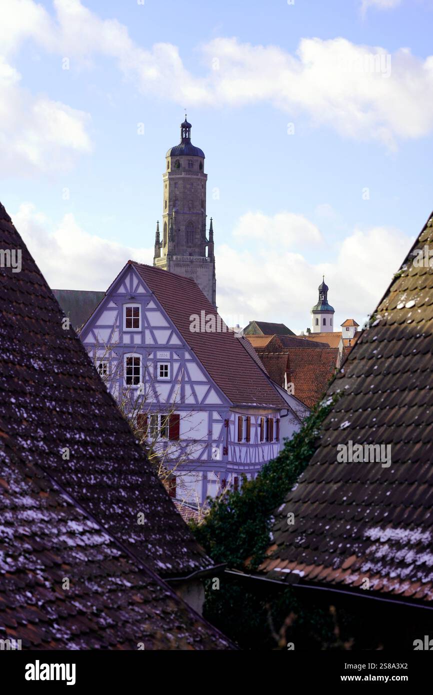 Medieval town centre with two church steeples visible in the background ...