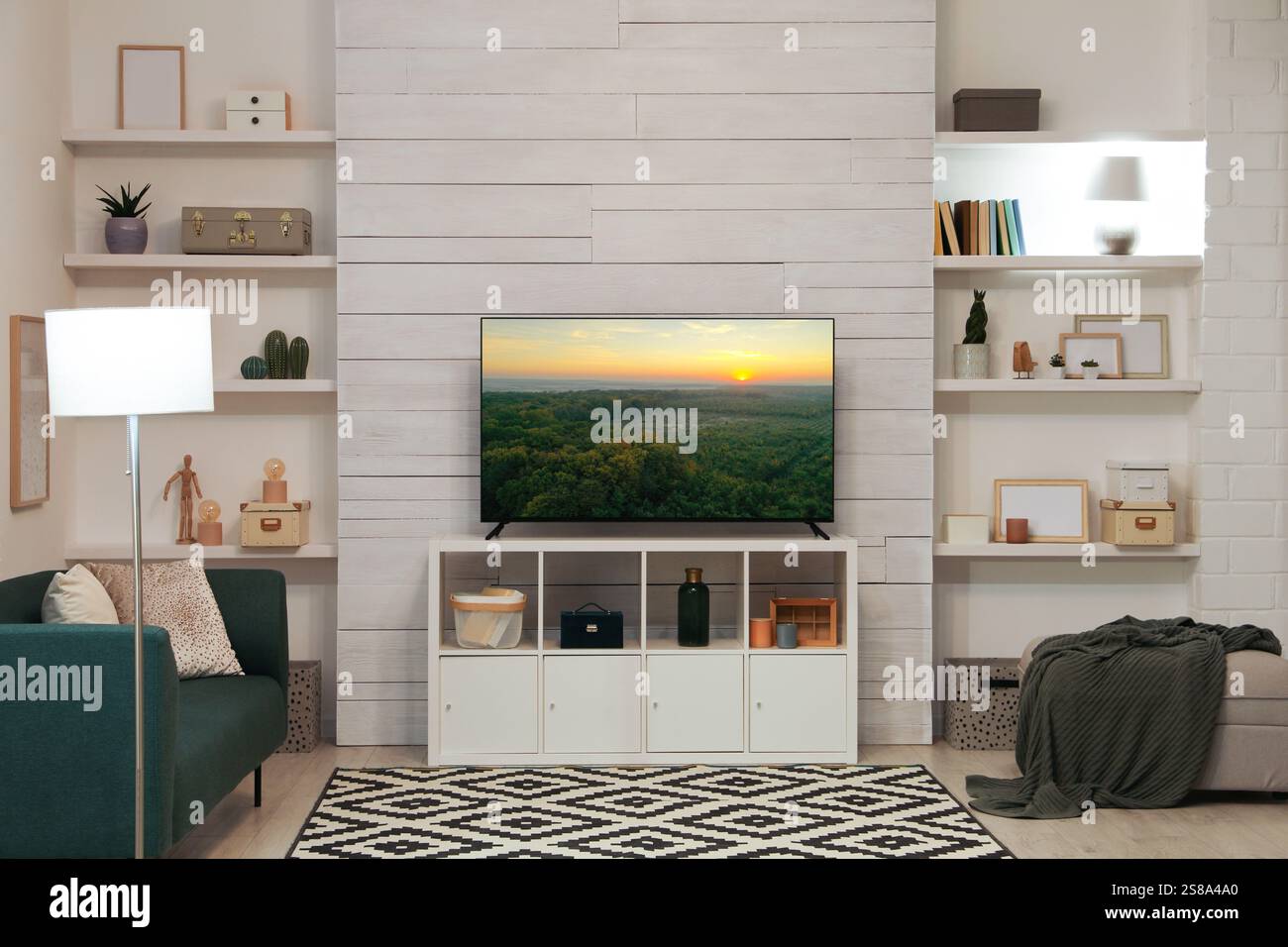 TV set with nature landscape on screen in room Stock Photo - Alamy