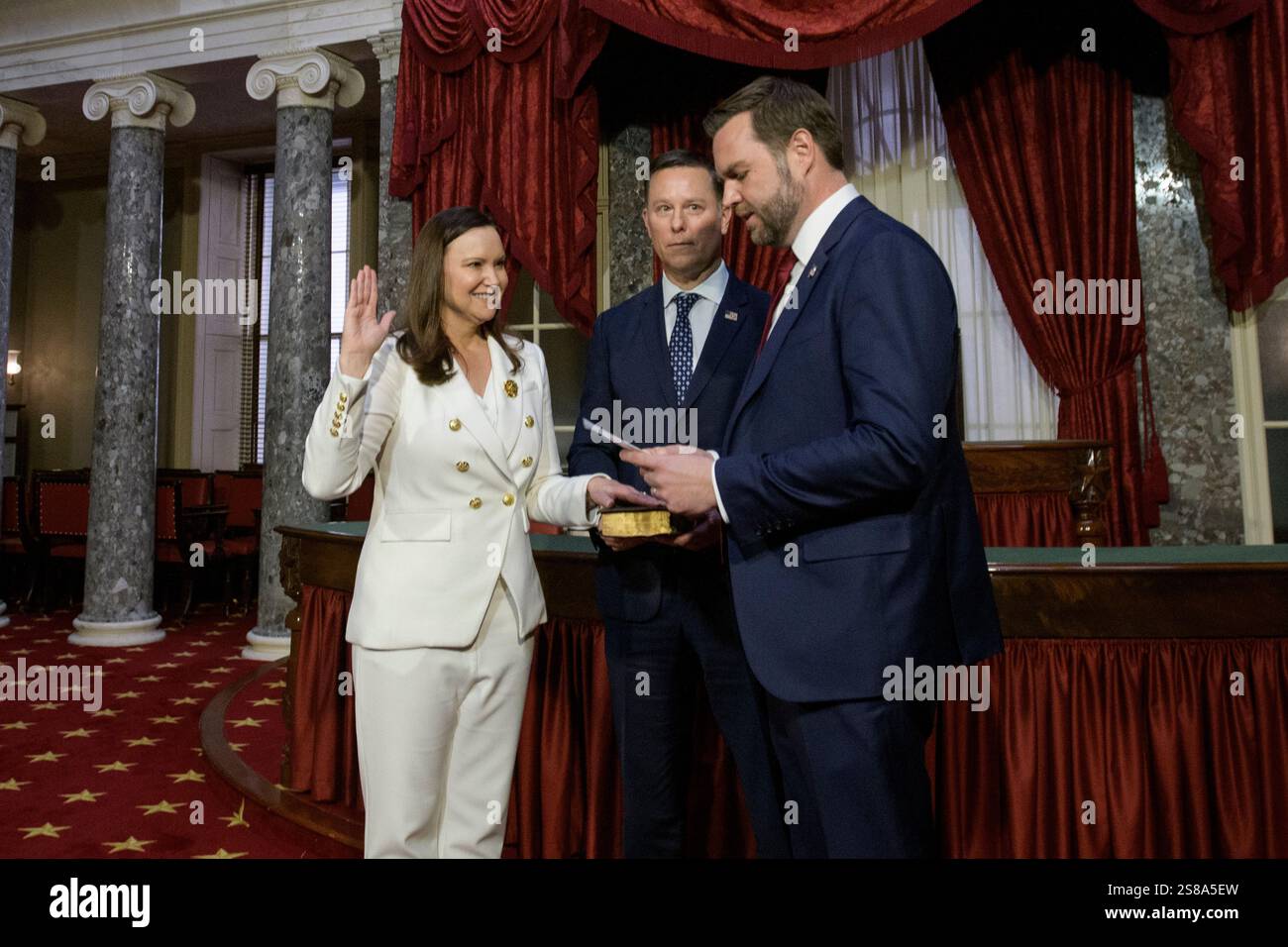 Vice President JD Vance, right, holds a ceremonial swearing-in for Sen ...