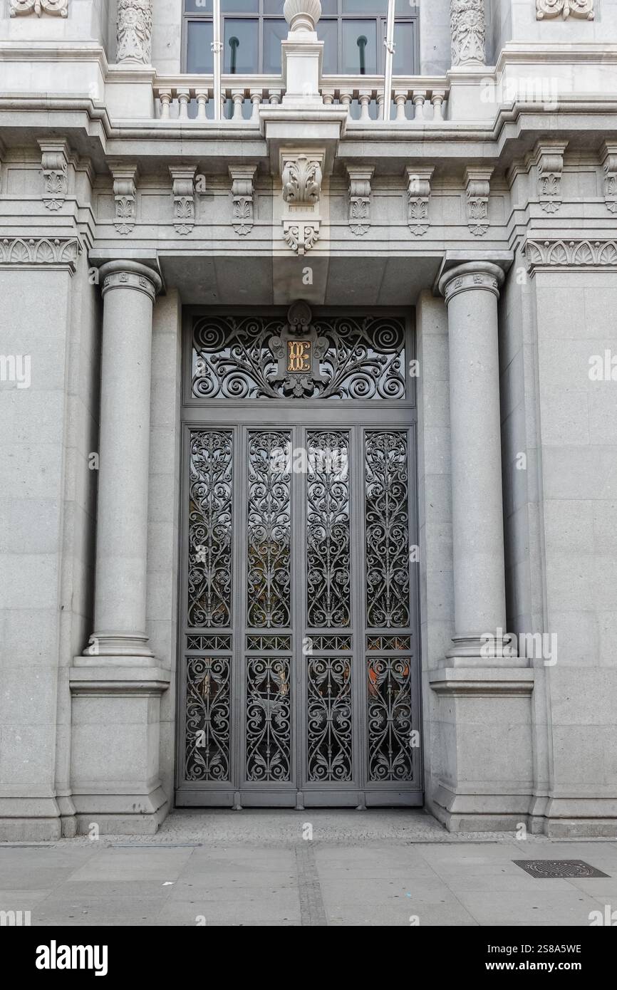 Front of Sepblac government office with dark grey wire door and Roman ...