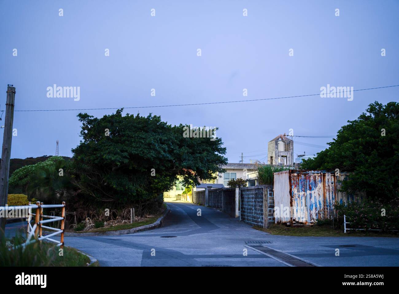 Night sky and seaside townscape before dawn in spring at Aka Island ...