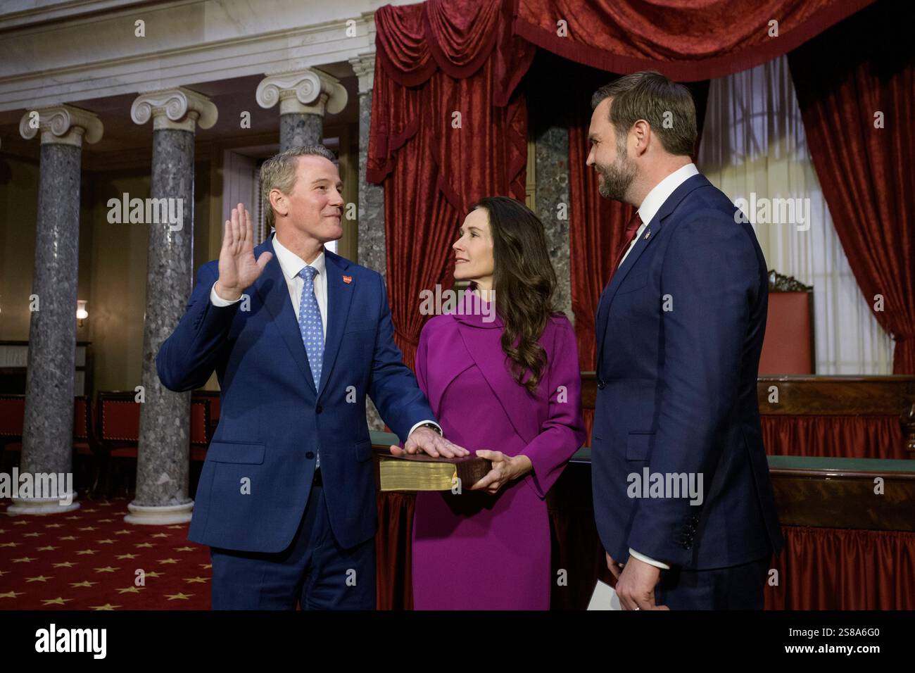 Vice President JD Vance, right, holds a ceremonial swearing-in for Sen ...