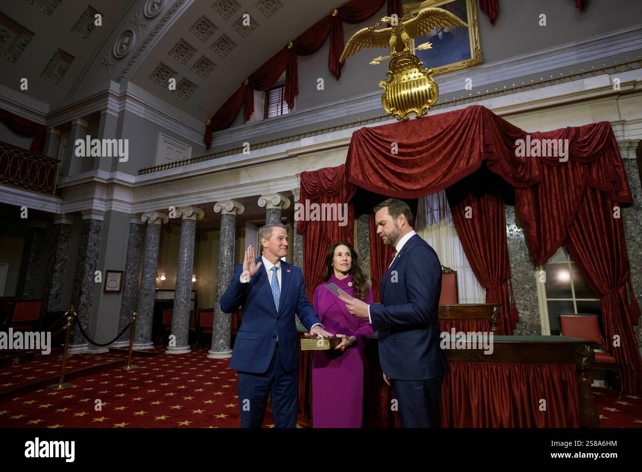 Vice President JD Vance, right, holds a ceremonial swearing-in for Sen ...