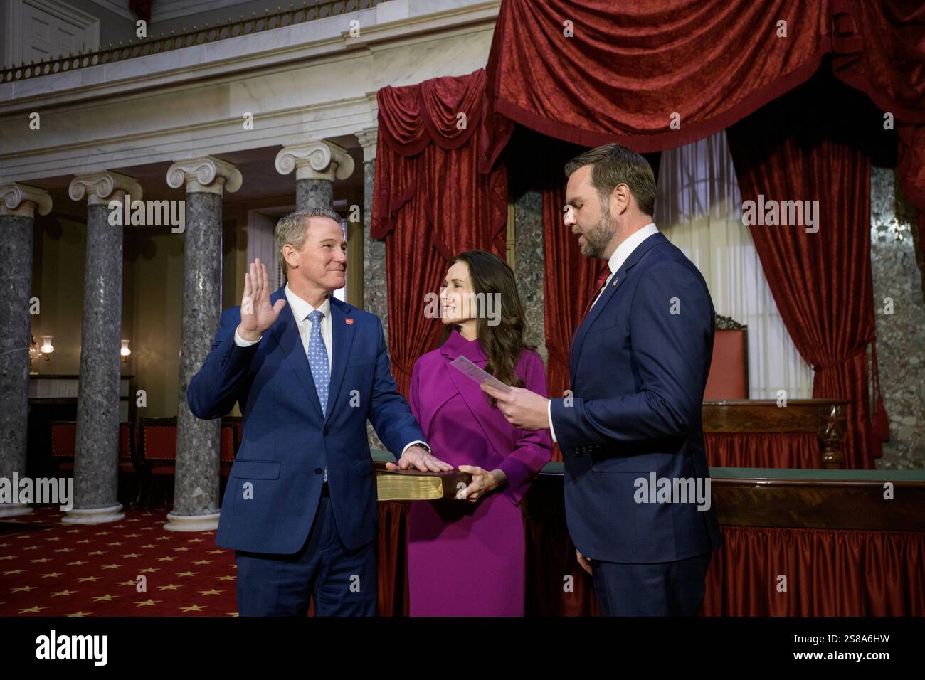 Vice President JD Vance, right, holds a ceremonial swearing-in for Sen ...