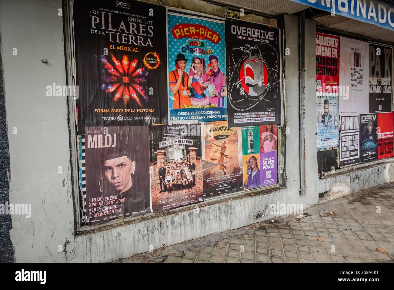 Old posters on the exterior wall outside in Madrid Stock Photo - Alamy