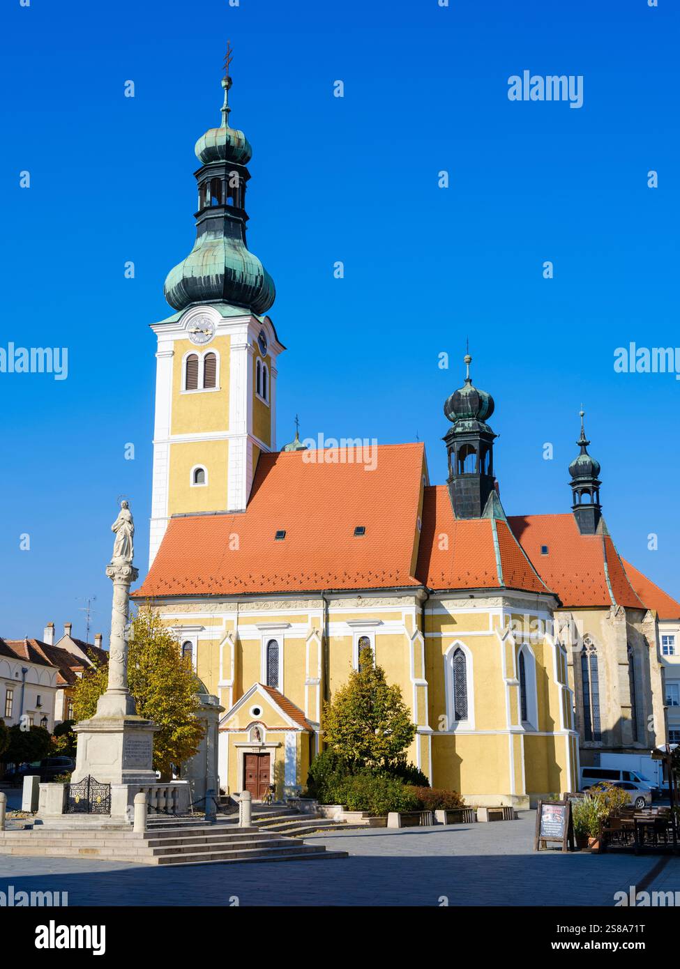 Church of Saint Emeric with Maria column The medieval town Koszeg in ...