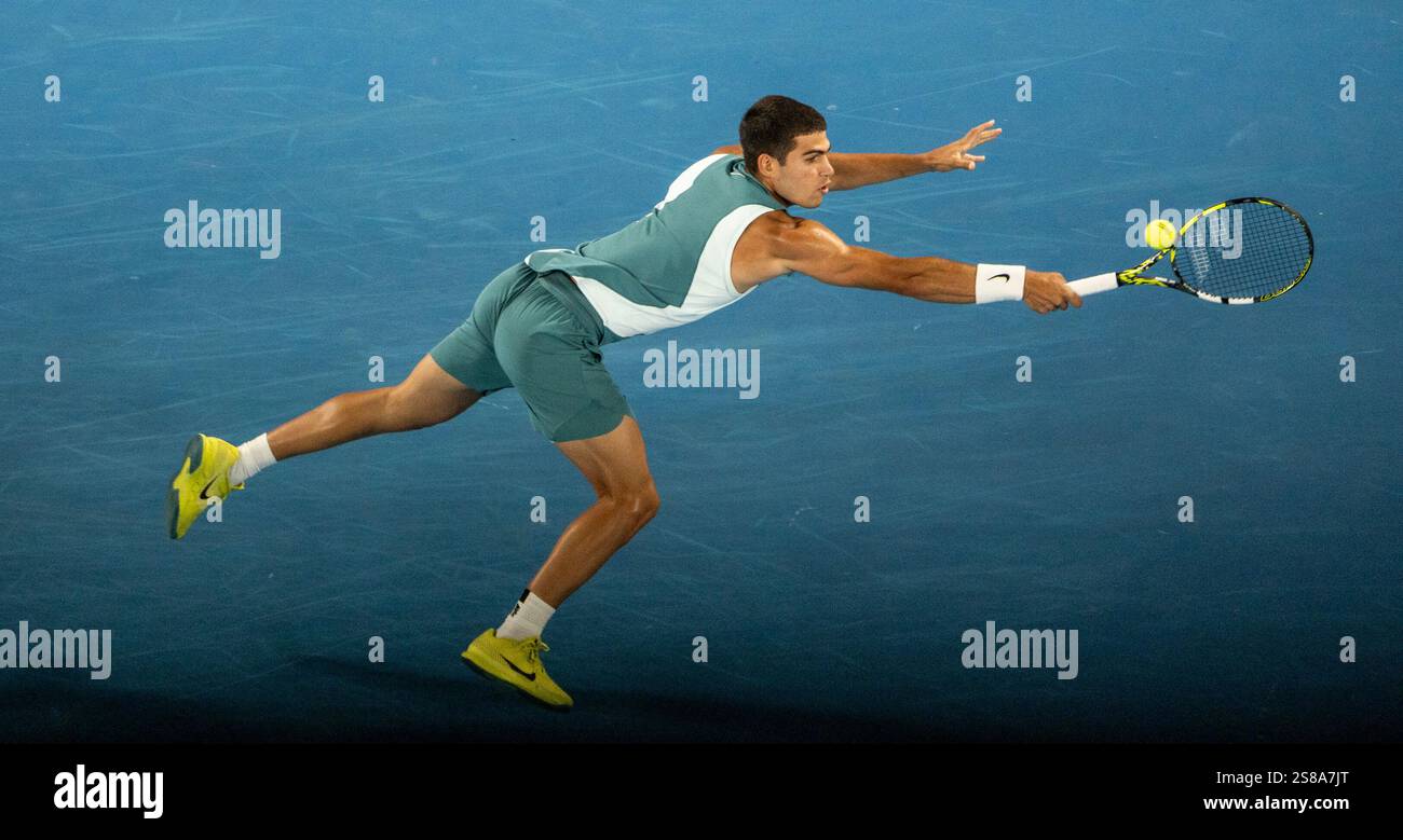 Melbourne, Australia. 21st Jan, 2025. Carlos Alcaraz hits a return ...