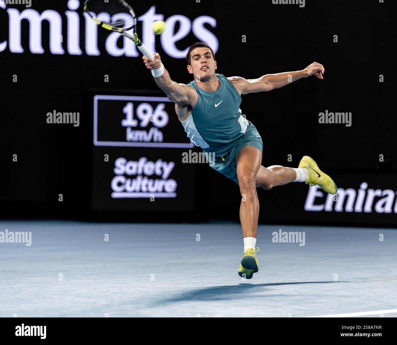 Melbourne, Australia. 21st Jan, 2025. Carlos Alcaraz hits a return ...