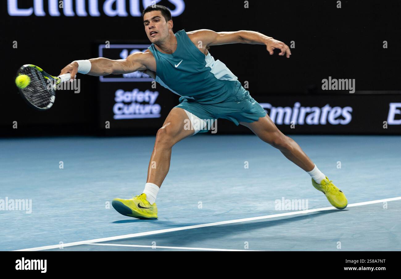 Melbourne, Australia. 21st Jan, 2025. Carlos Alcaraz hits a return ...