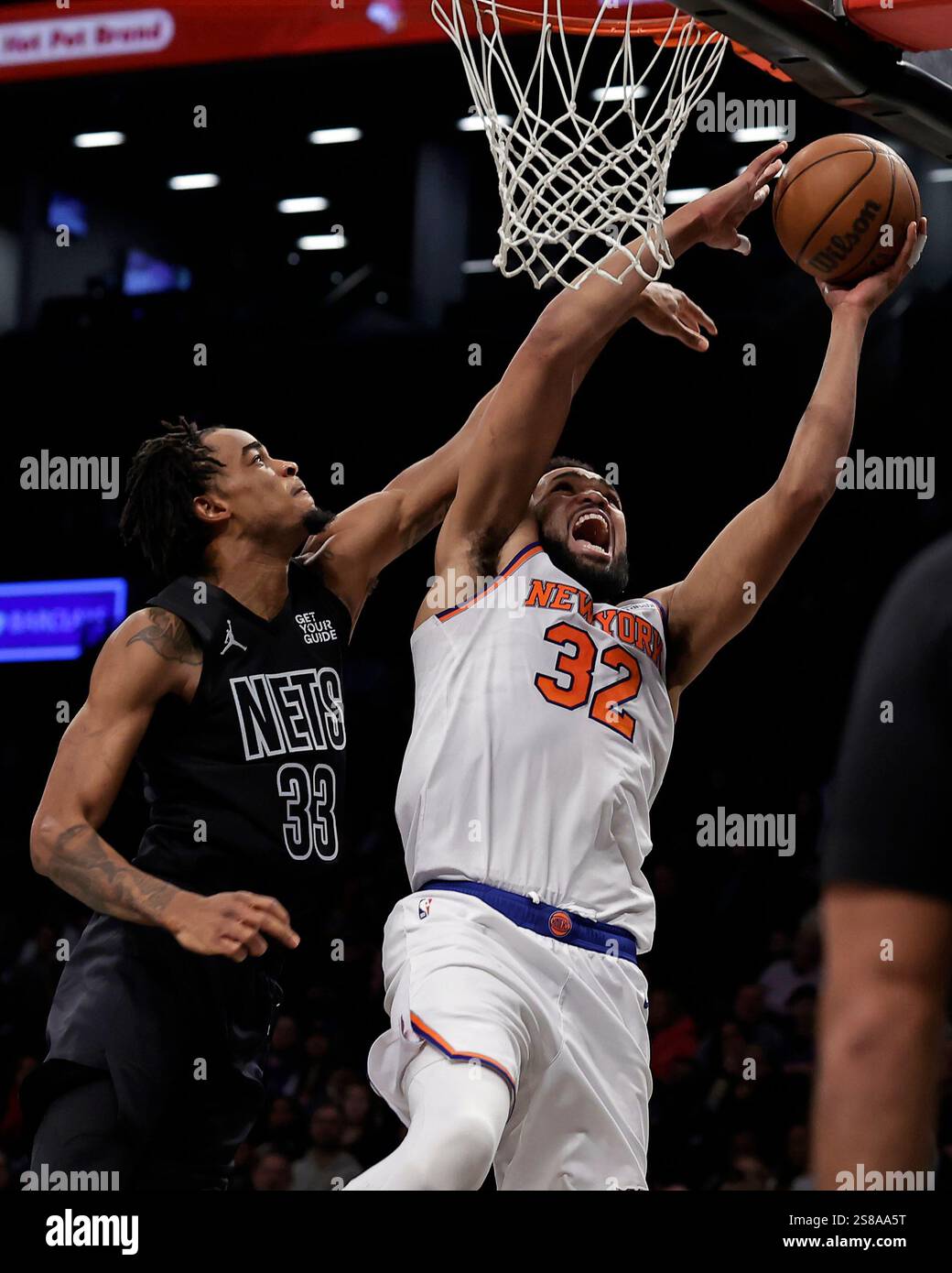New York Knicks center Karl-Anthony Towns drives to the basket past ...