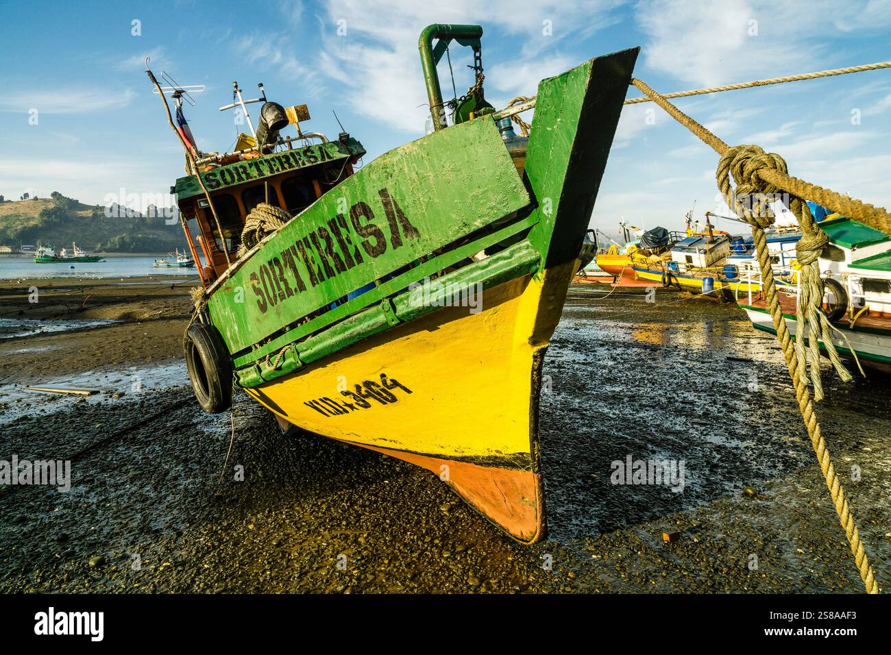 Stranded boats at low tide, Dalcahue, Chiloé Island, Patagonia ...