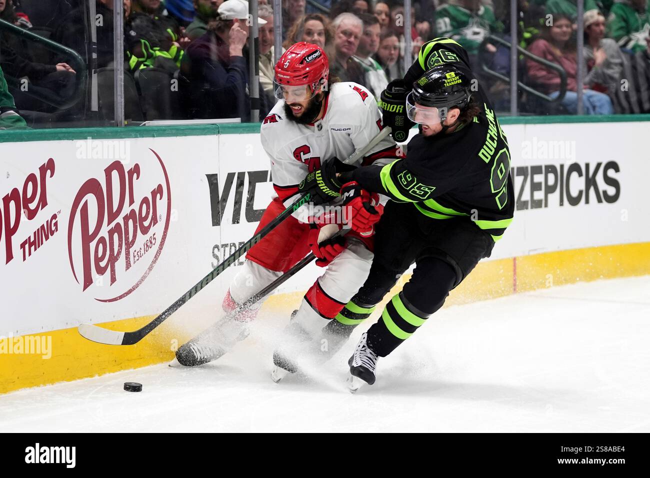 Carolina Hurricanes defenseman Jalen Chatfield and Dallas Stars center ...