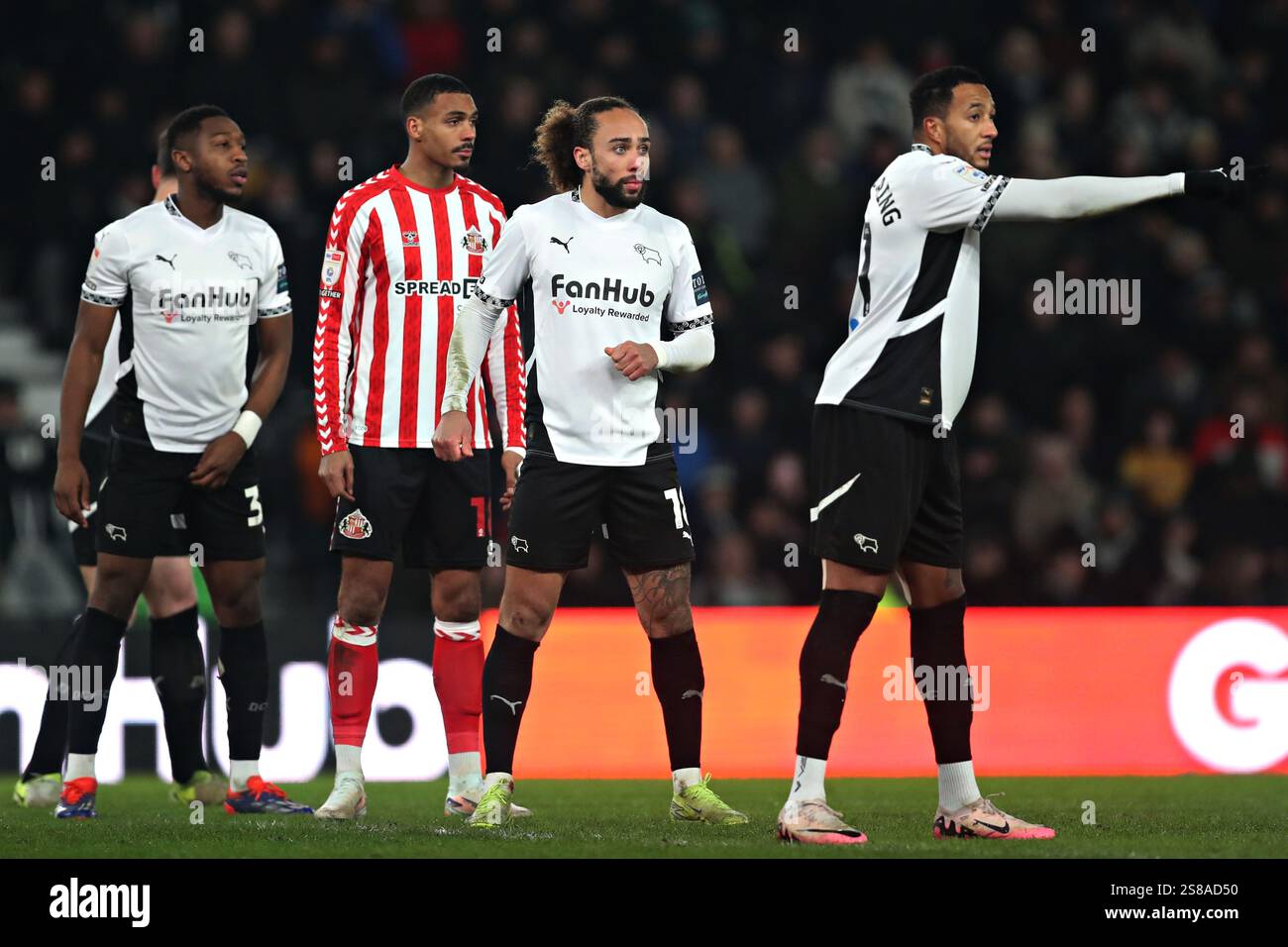 Derby, UK. 21st Jan, 2025. Joe Ward of Derby County, Marcus Harness of ...